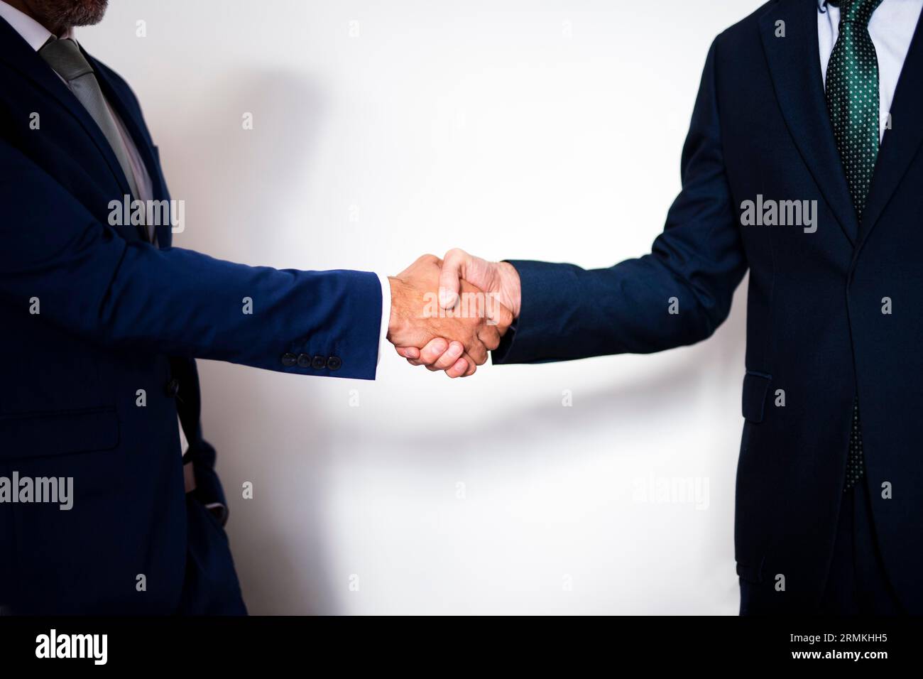 Front view business handshake collaboration Stock Photo - Alamy