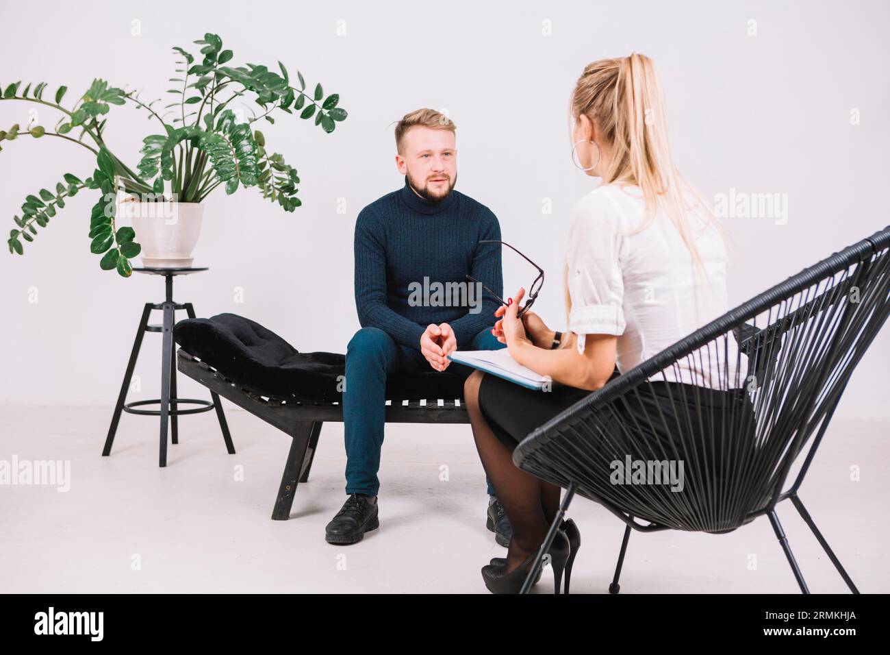 Female psychologist therapy session with her client office Stock Photo ...