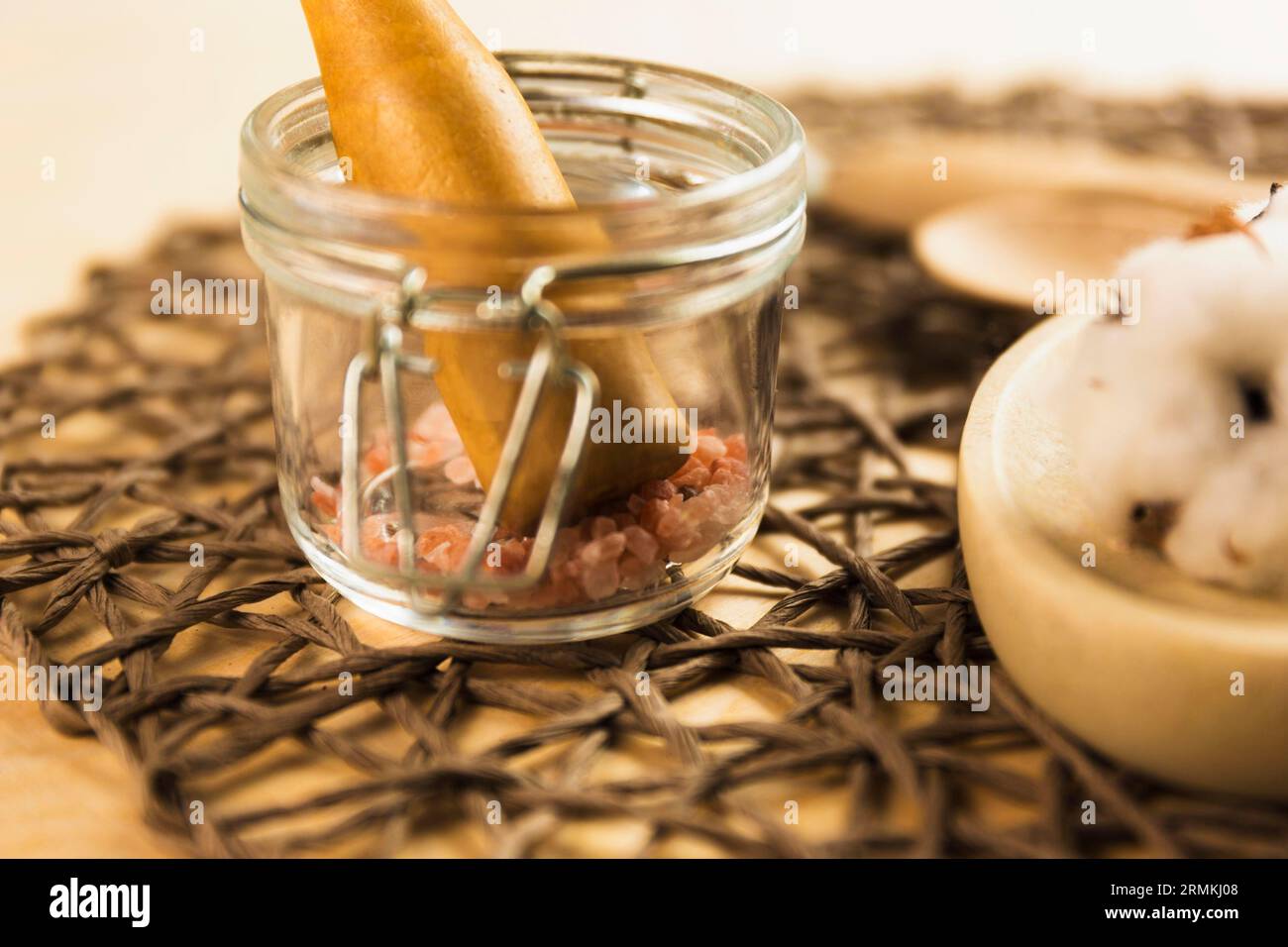 Himalayan salt glass jar with pestle Stock Photo - Alamy