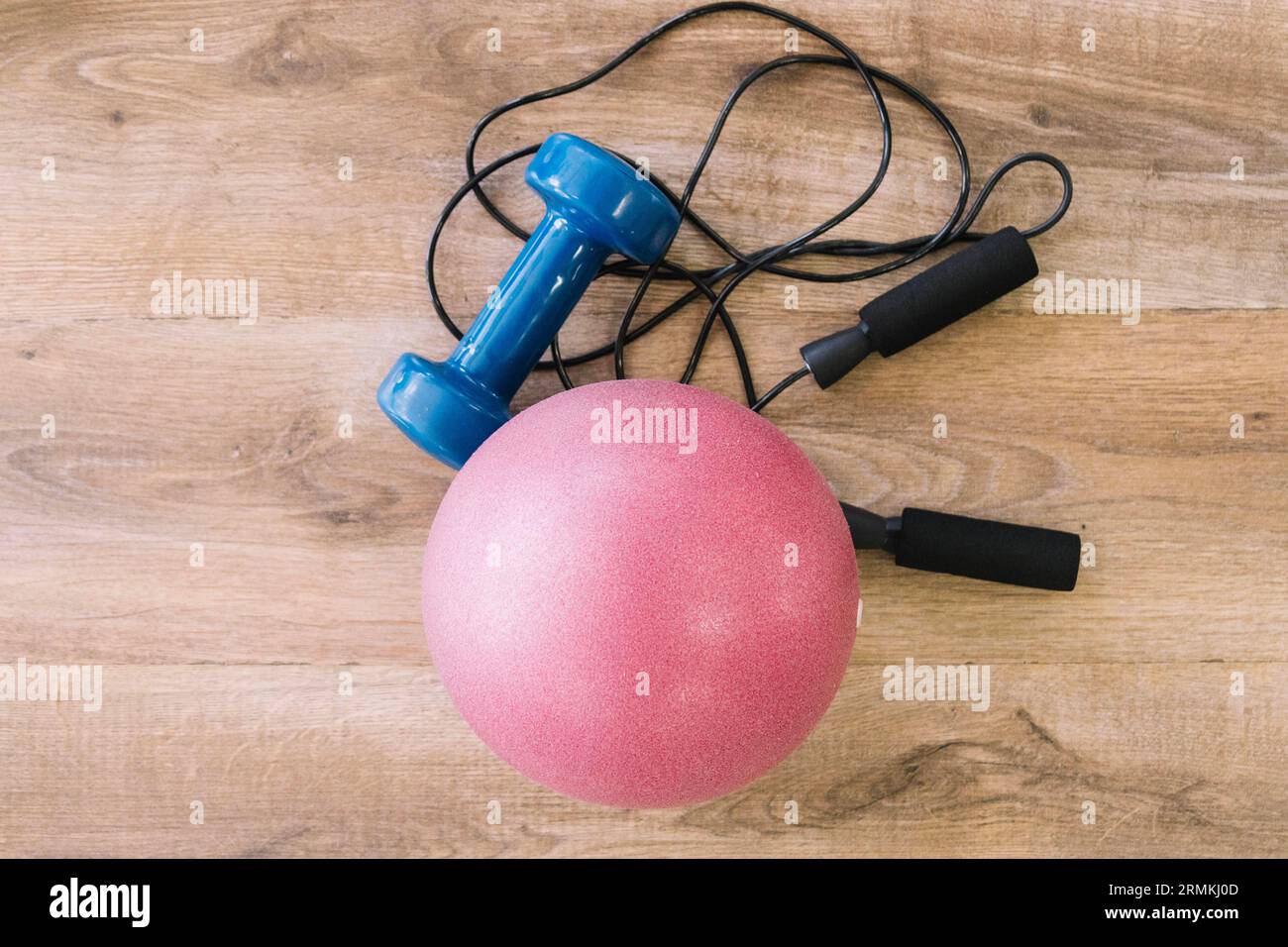 Jump rope dumbbell rubber ball Stock Photo - Alamy
