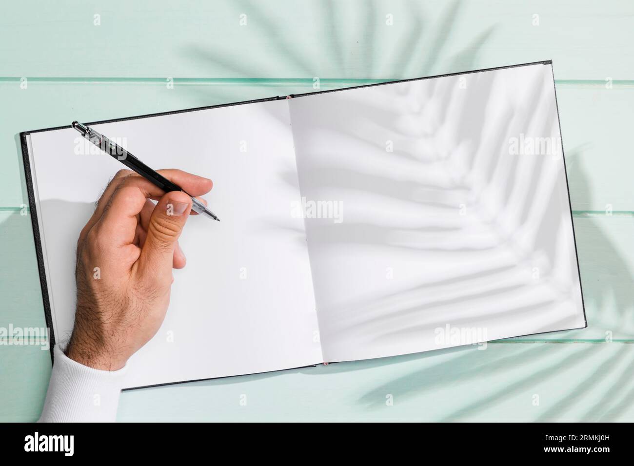 Notebook shadow hi-res stock photography and images - Alamy