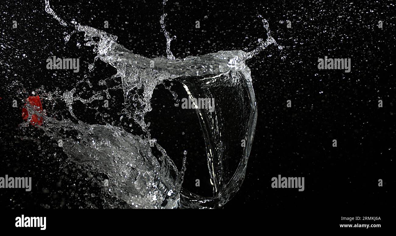 Shot Breaking Water Filled Red Balloon Stock Photo - Alamy