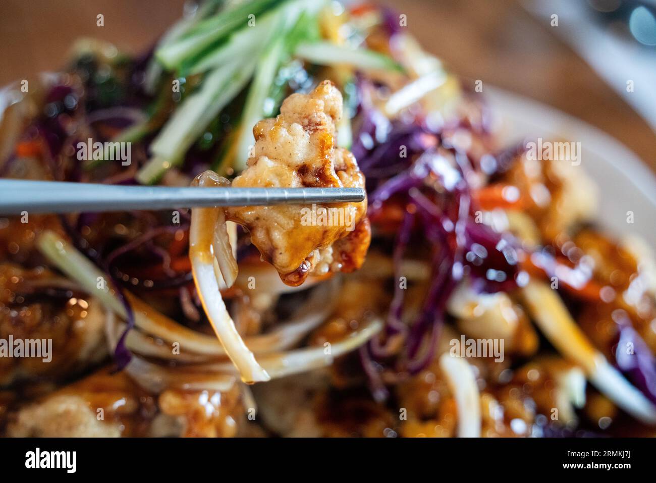 Delicious Korean-style Chinese sweet and sour sauced deep fried pork ...