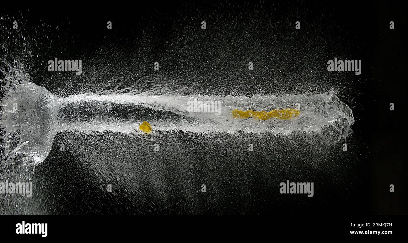 Breaking water balloon hi-res stock photography and images - Alamy