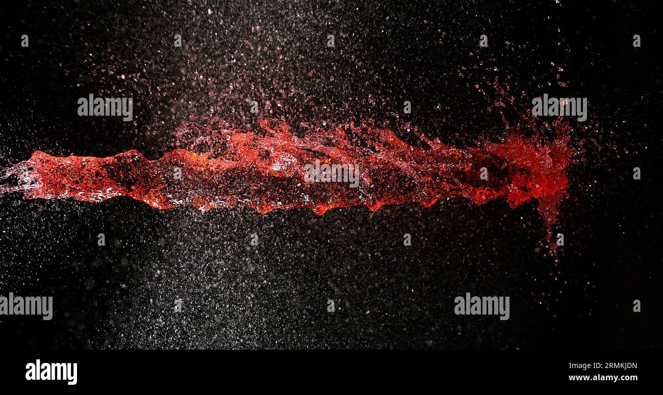 Shot breaking water filled red hi-res stock photography and images - Alamy