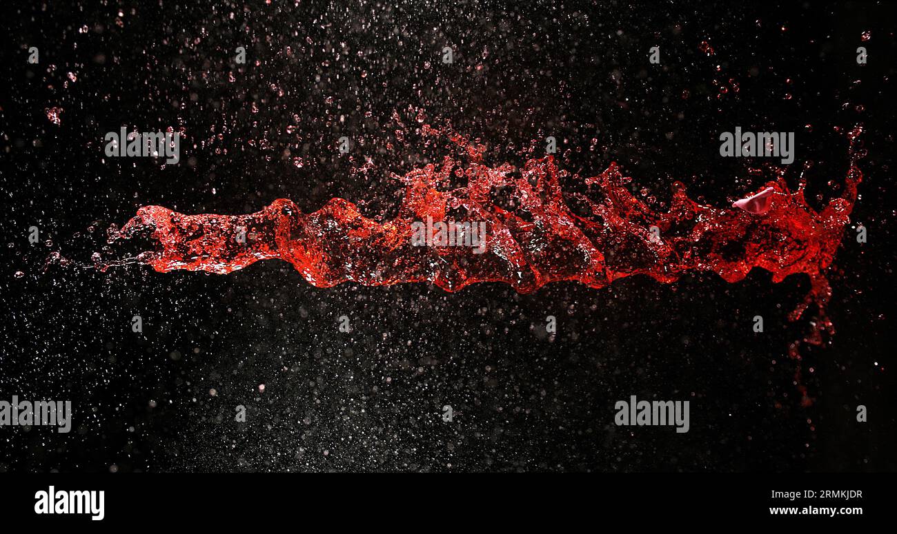 Shot Breaking Water Filled Red Balloon Stock Photo - Alamy