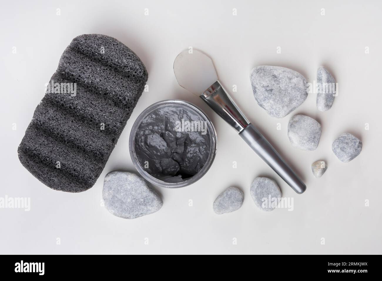 Pumice stone spa stones clay mask brush white background Stock Photo ...