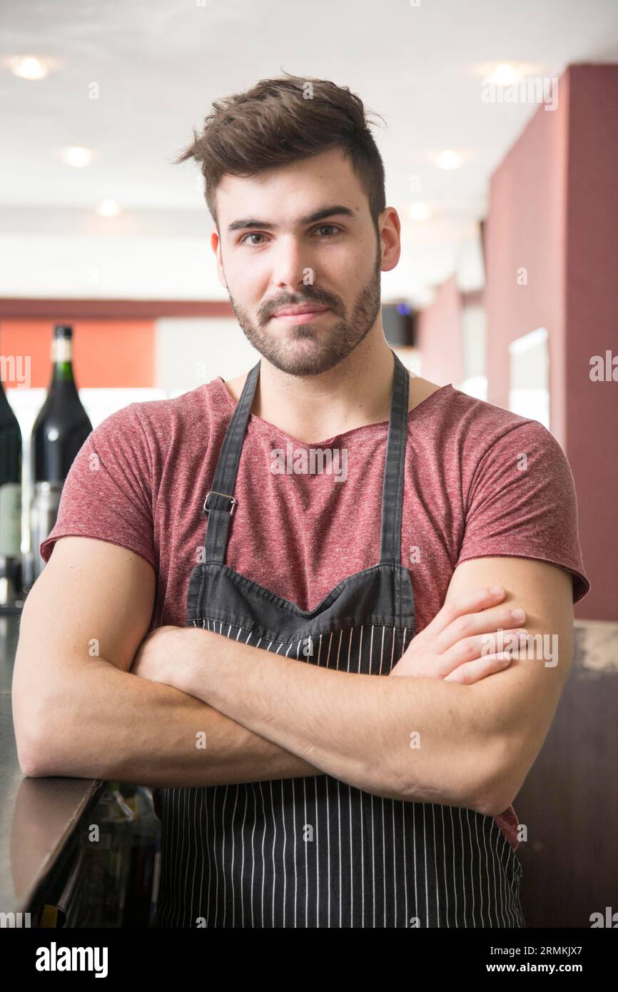 Bar man apron hi-res stock photography and images - Alamy