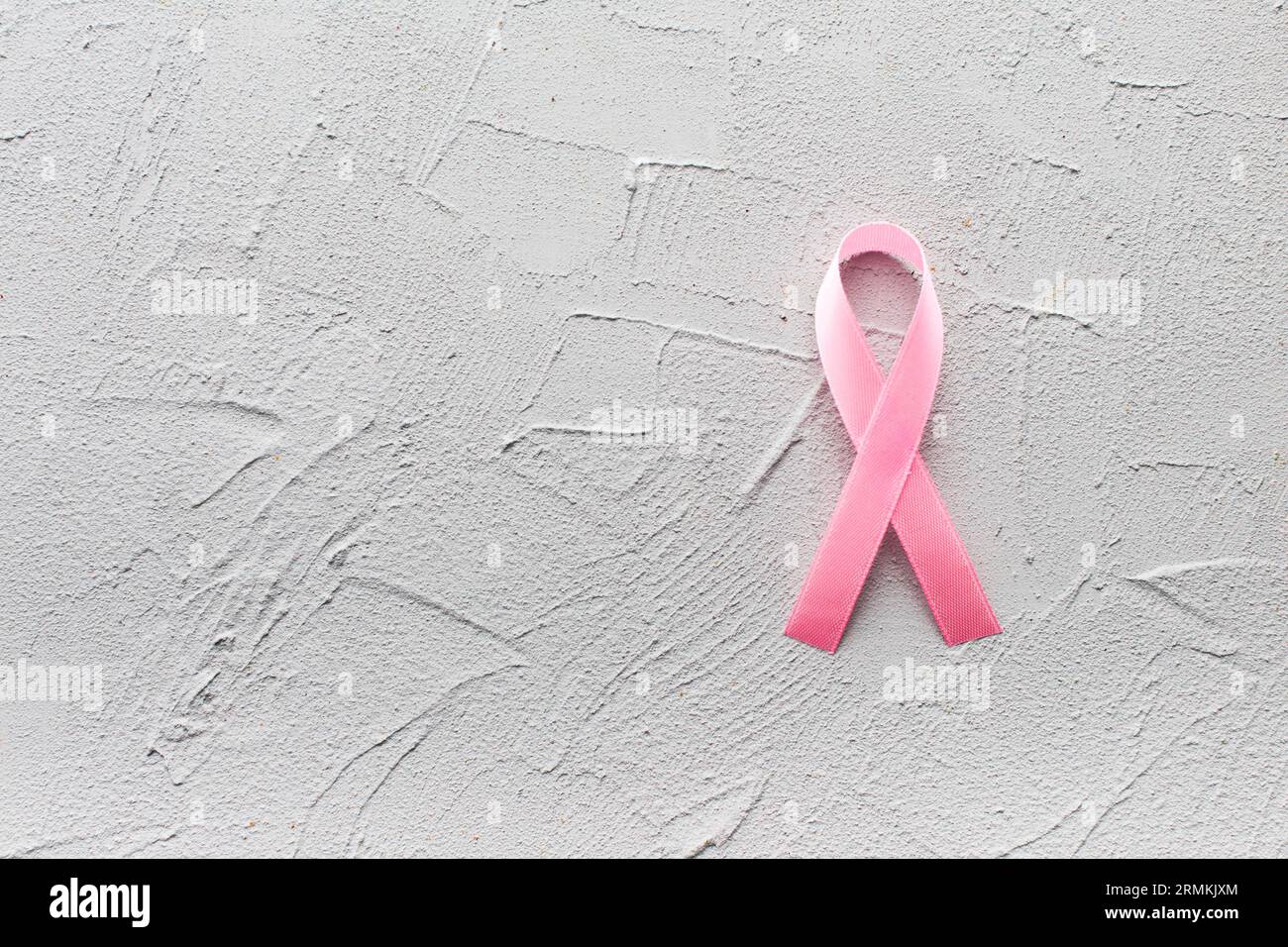 Ribbon pink color plaster background Stock Photo - Alamy