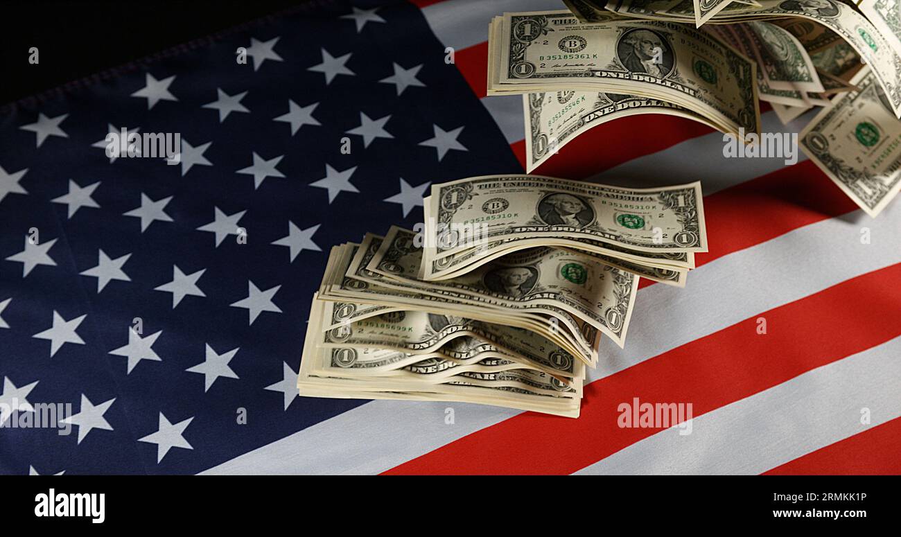 1 US Dollar Banknotes Flying on American Flag Stock Photo - Alamy