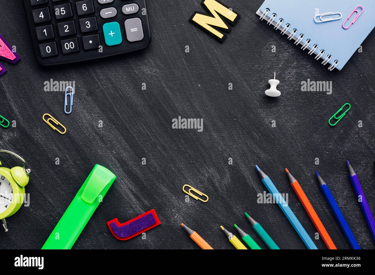 School supplies scattered like frame chalkboard Stock Photo - Alamy