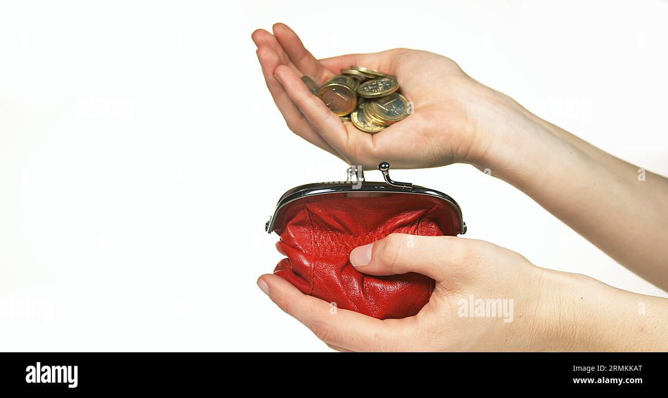 Money falling out of purse hi-res stock photography and images - Alamy