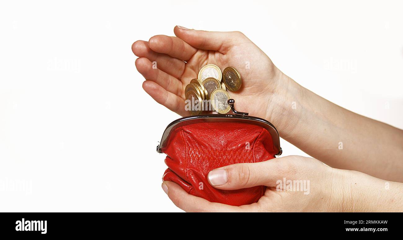 Hands of Woman and Purse with Euro Coins against white Background Stock ...