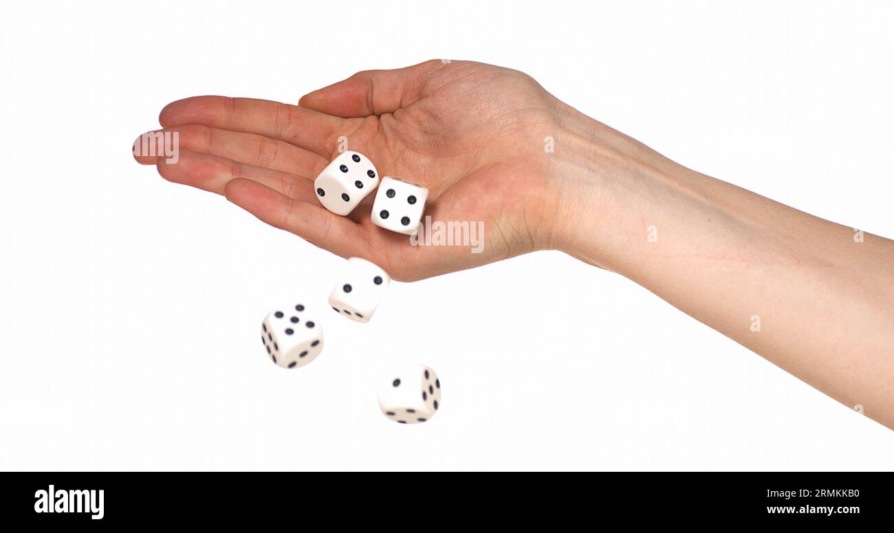 Hand of Woman Throwing Dice against White Background Stock Photo - Alamy