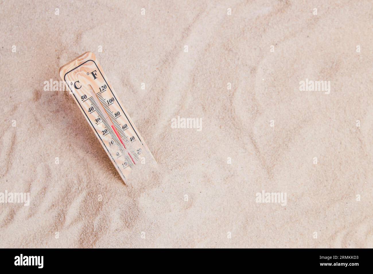 Summer composition with sand thermometer Stock Photo - Alamy