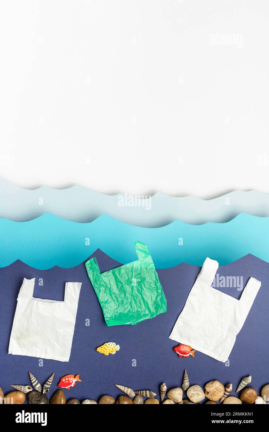 Top view plastic bags rocks paper ocean Stock Photo - Alamy