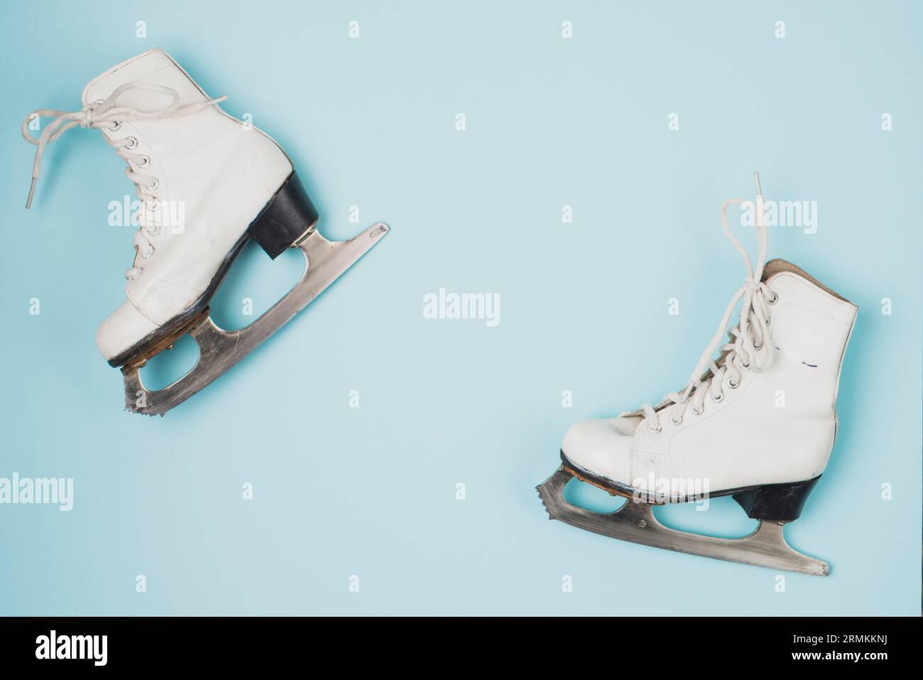 Two ice skates blue Stock Photo - Alamy