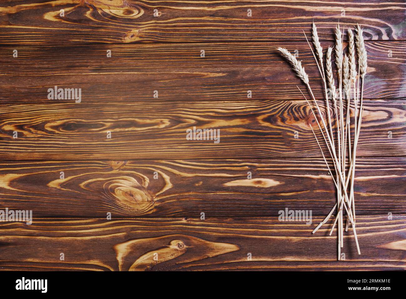 Wheat wooden surface Stock Photo - Alamy