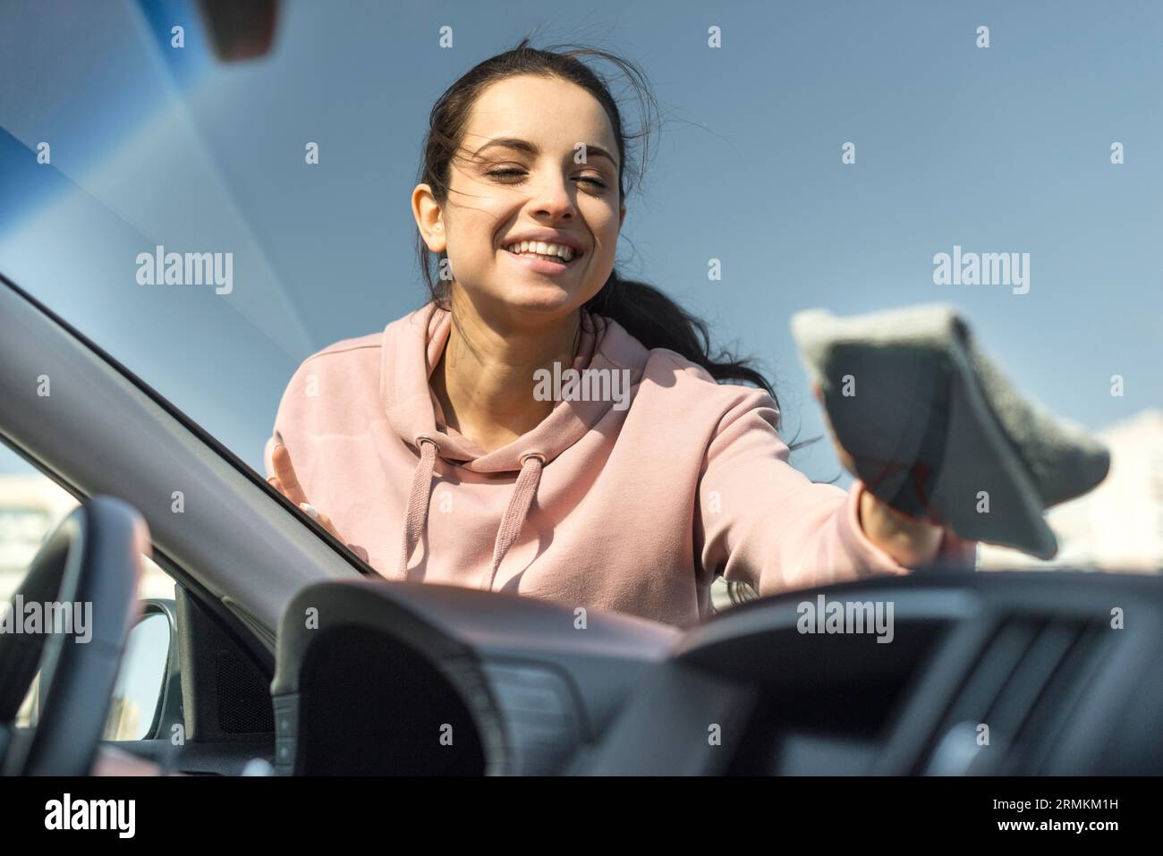Cleaning windscreen hi-res stock photography and images - Alamy