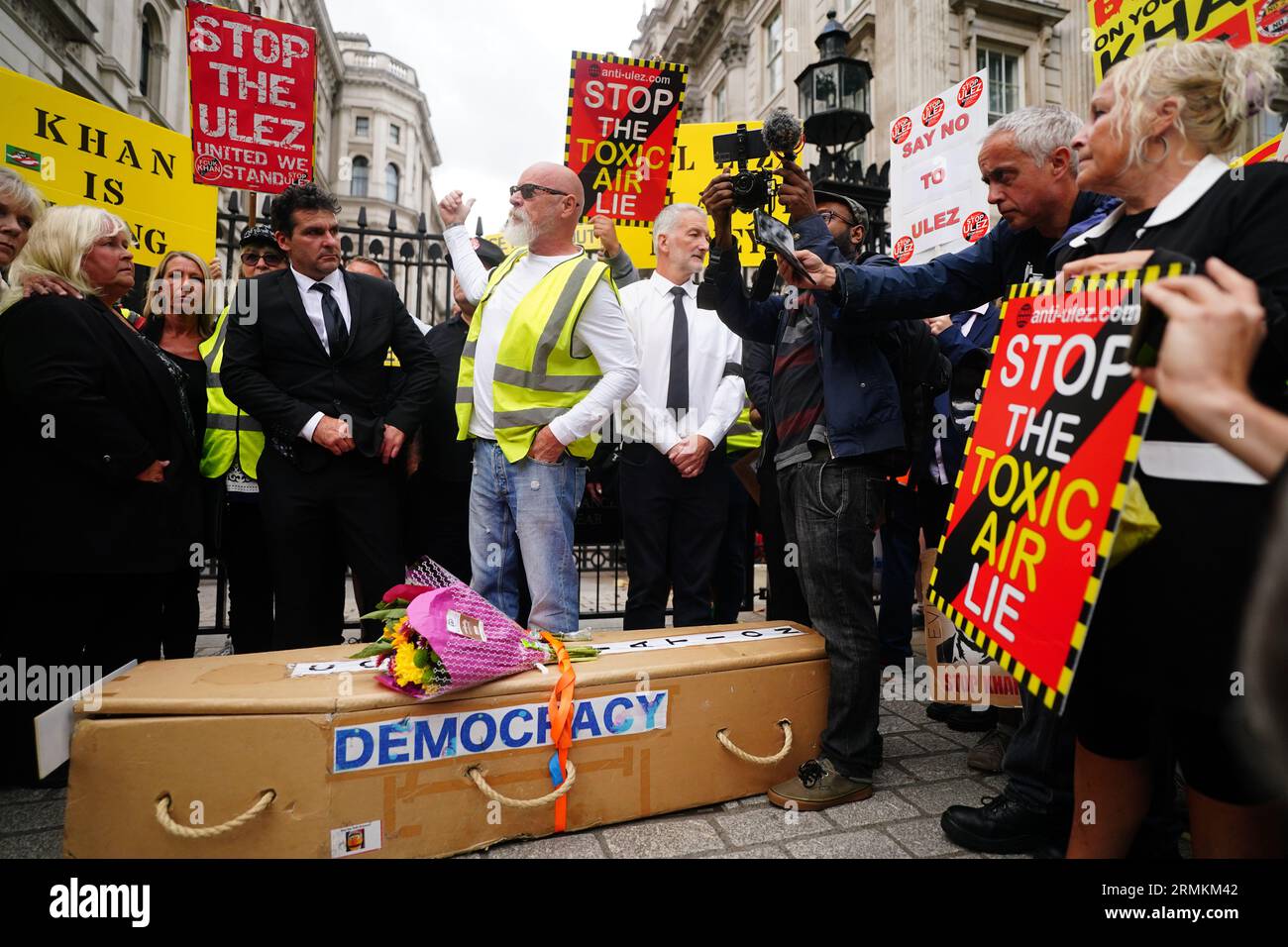 Protesters gather outside Downing Street in central London, on the ...