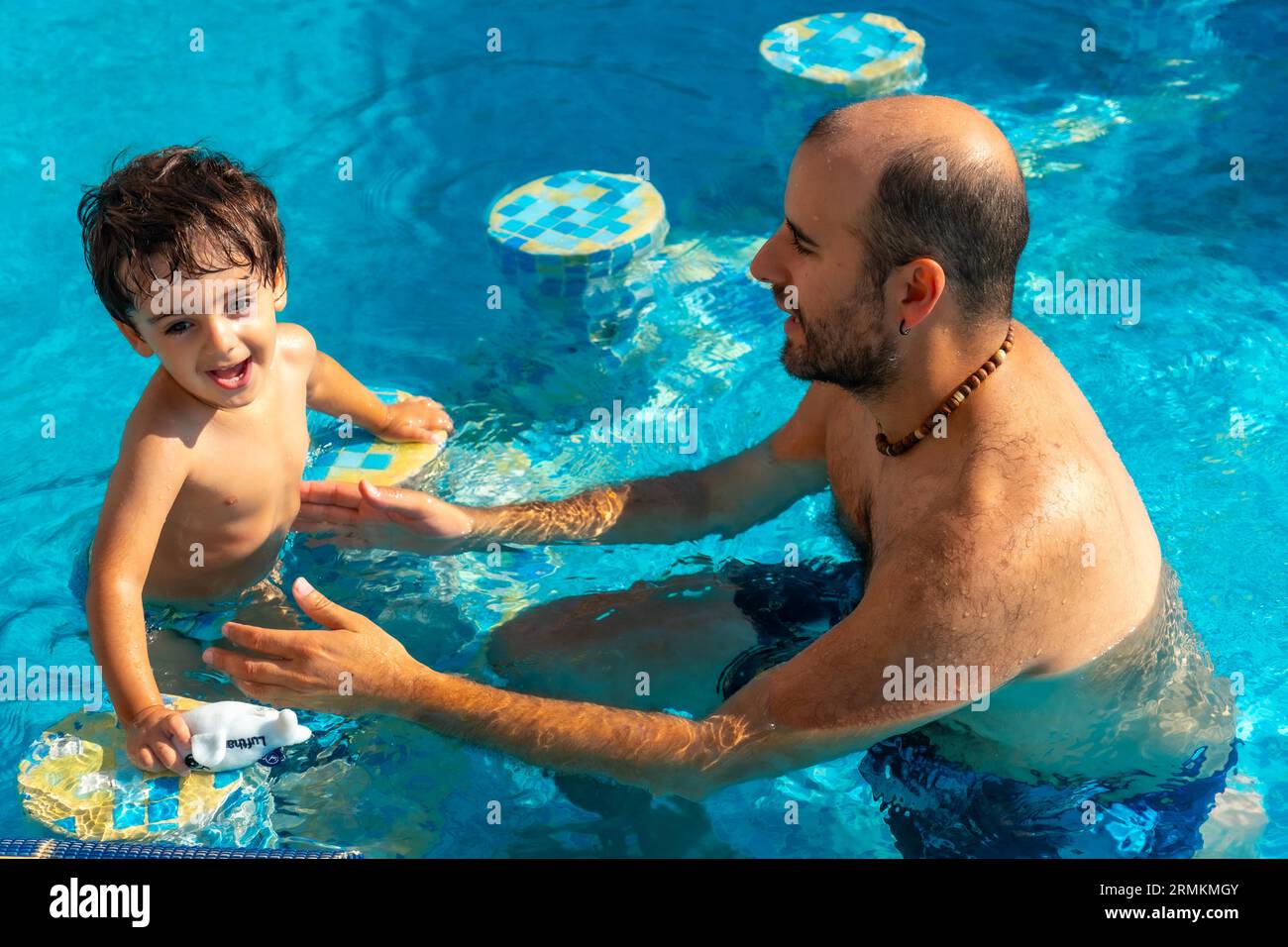 Father son swimming pool hi-res stock photography and images - Alamy
