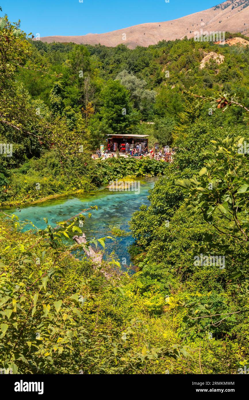 Tourists visiting The Blue eye or Syri i kalter, a natural phenomenon ...