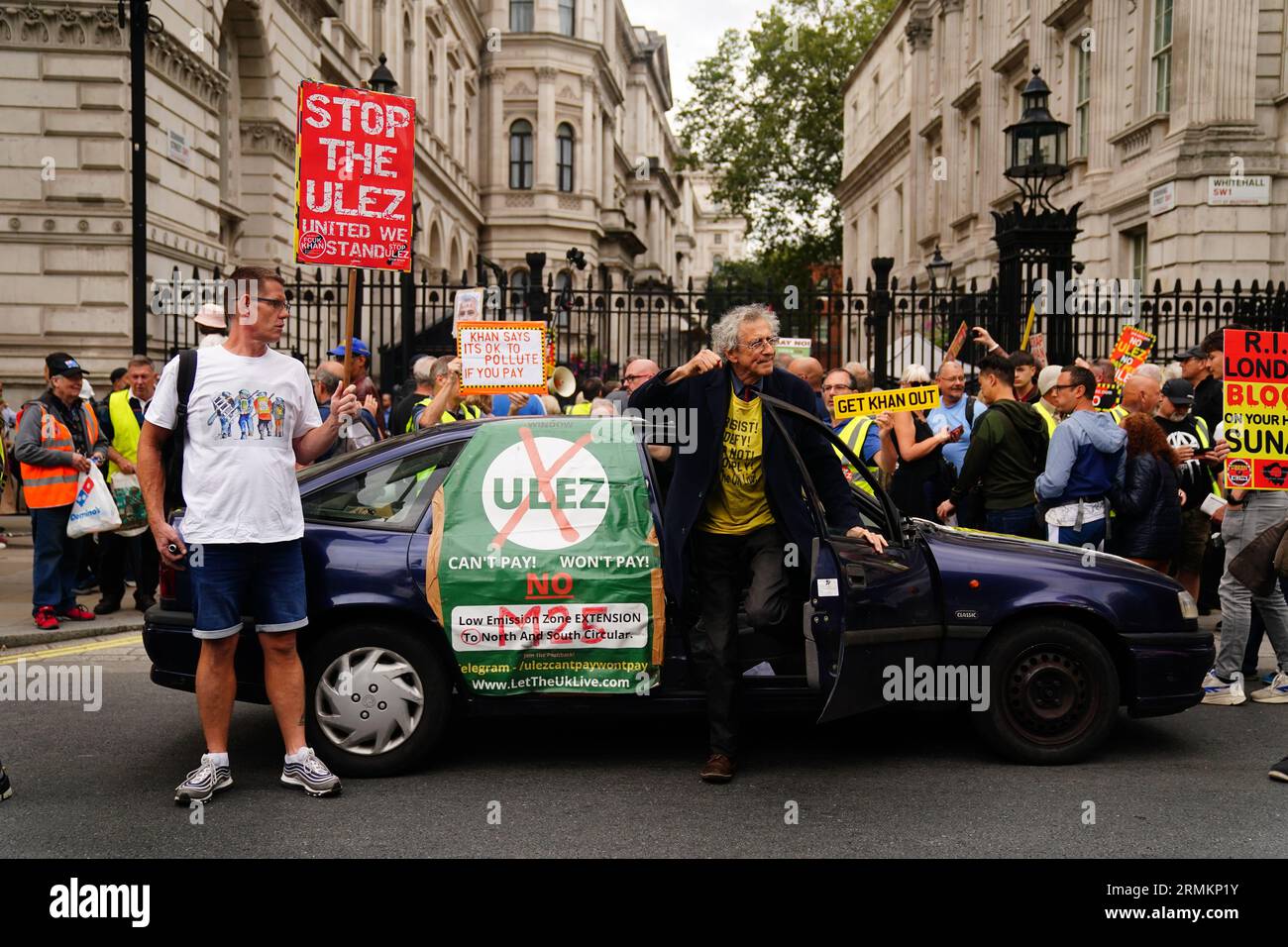 Piers Corbyn parks a car directly outside Downing Street in central ...