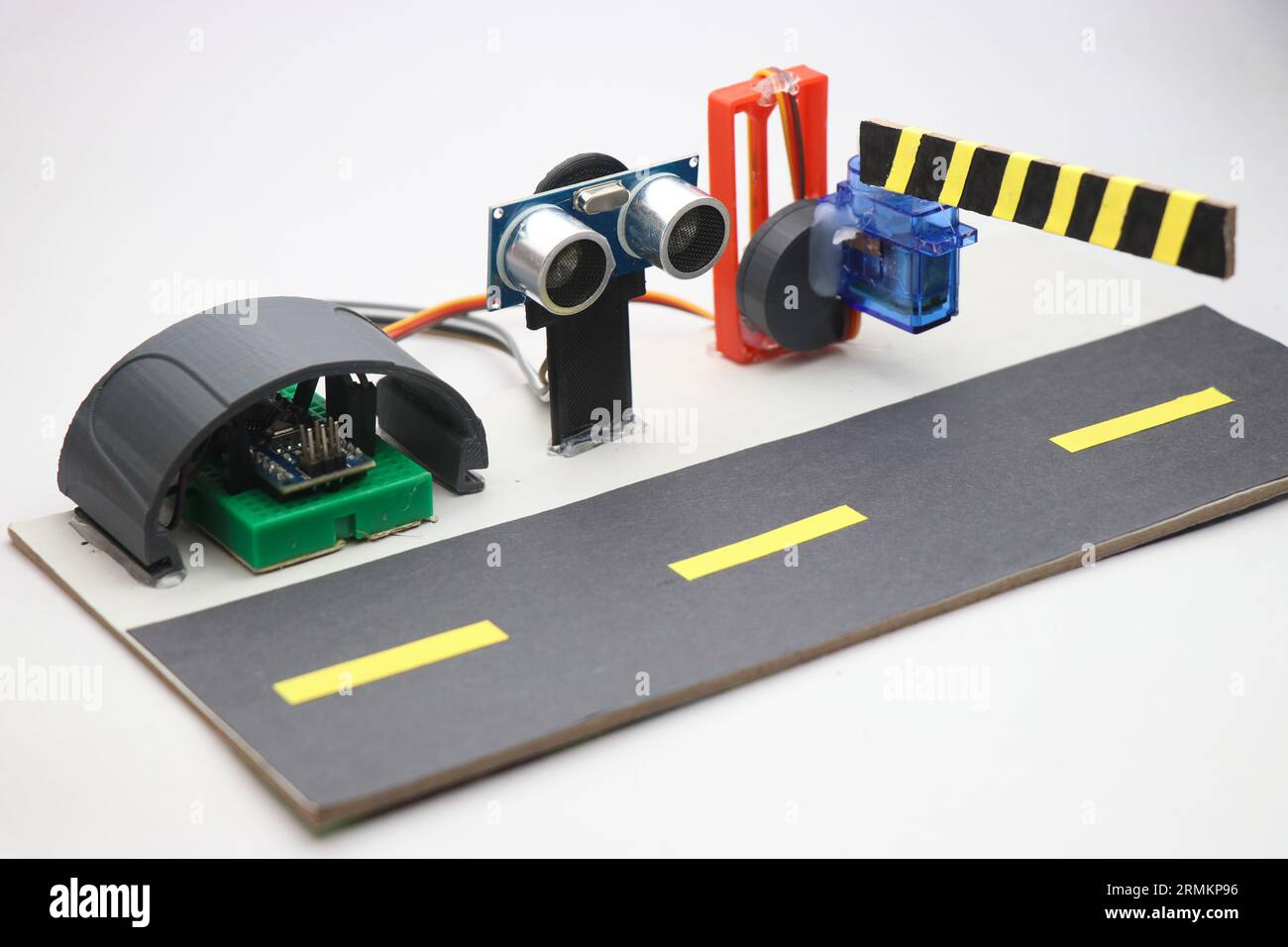 Electronic Components With Programmable Microcontrollers Are Connected To A Breadboard And 