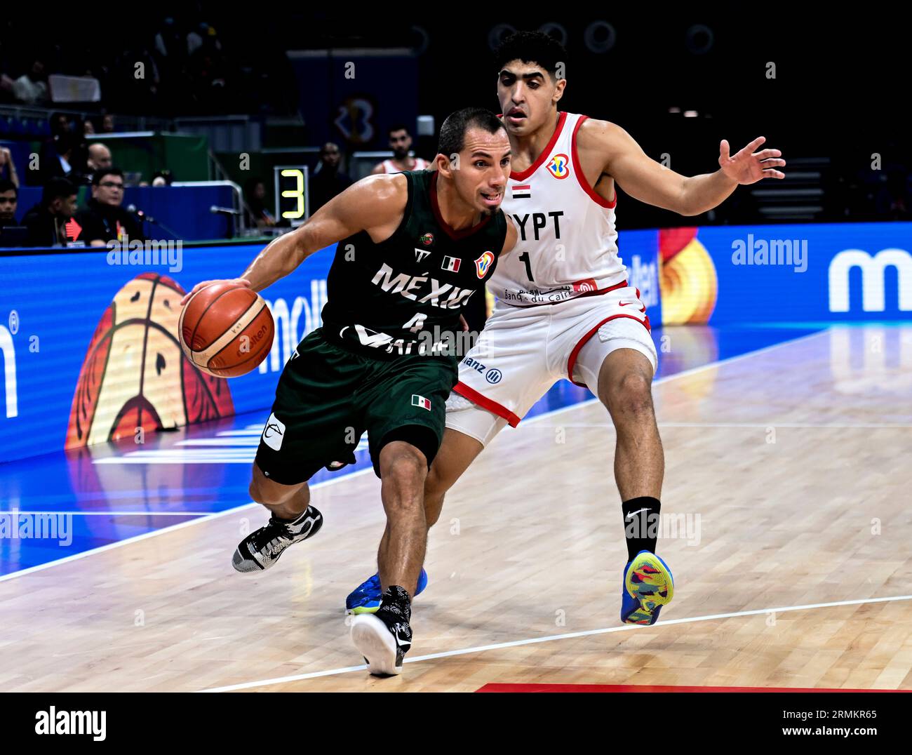 Manila, Philippines. 29th Aug, 2023. Mexico's Paul Stoll (L) breaks through during the Group D ...