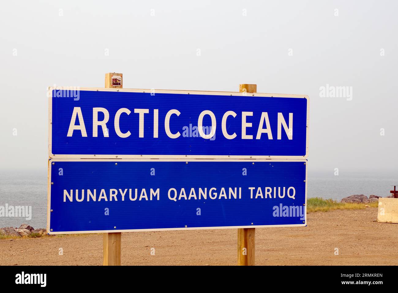 Town sign against overcast background, Tuktojaktuk, Arctic Ocean ...