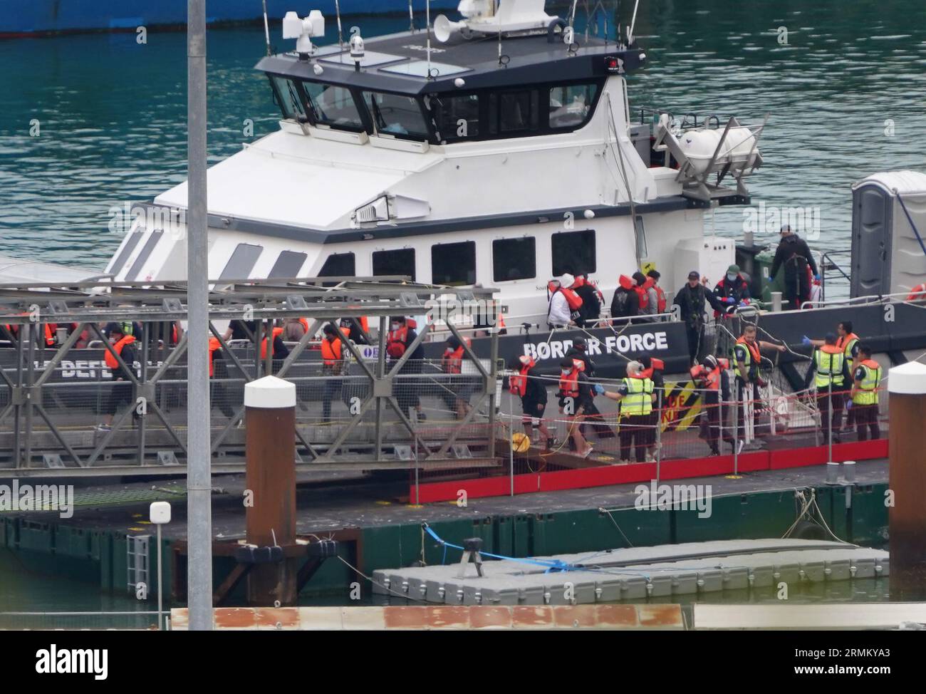 A group of people thought to be migrants arrive in Dover, Kent, onboard ...