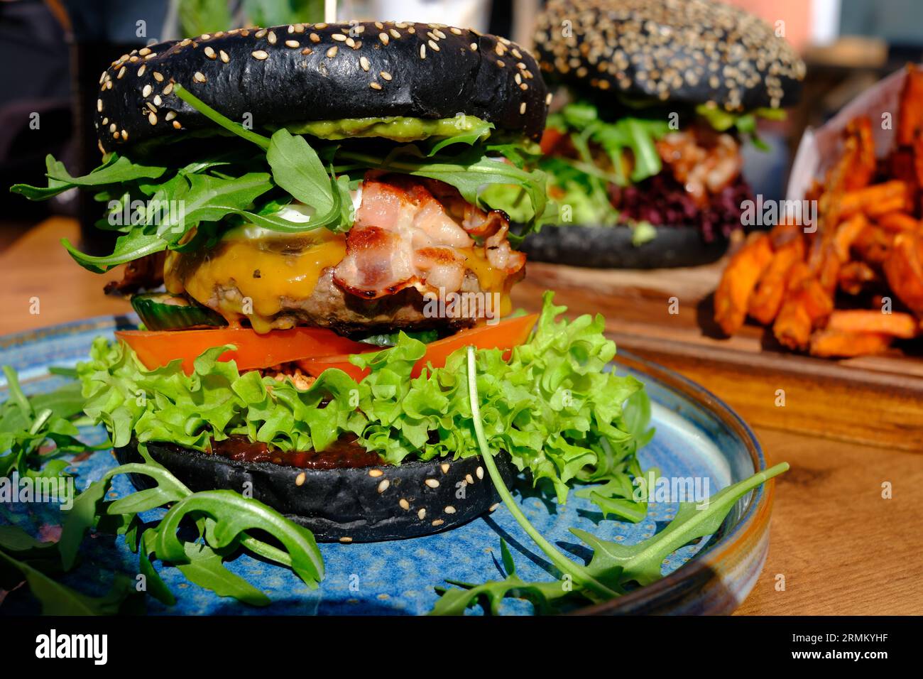 Big juicy burger salad vegetables hi-res stock photography and images ...