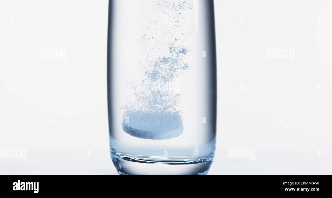 Tablets falling glass water against hi-res stock photography and images ...