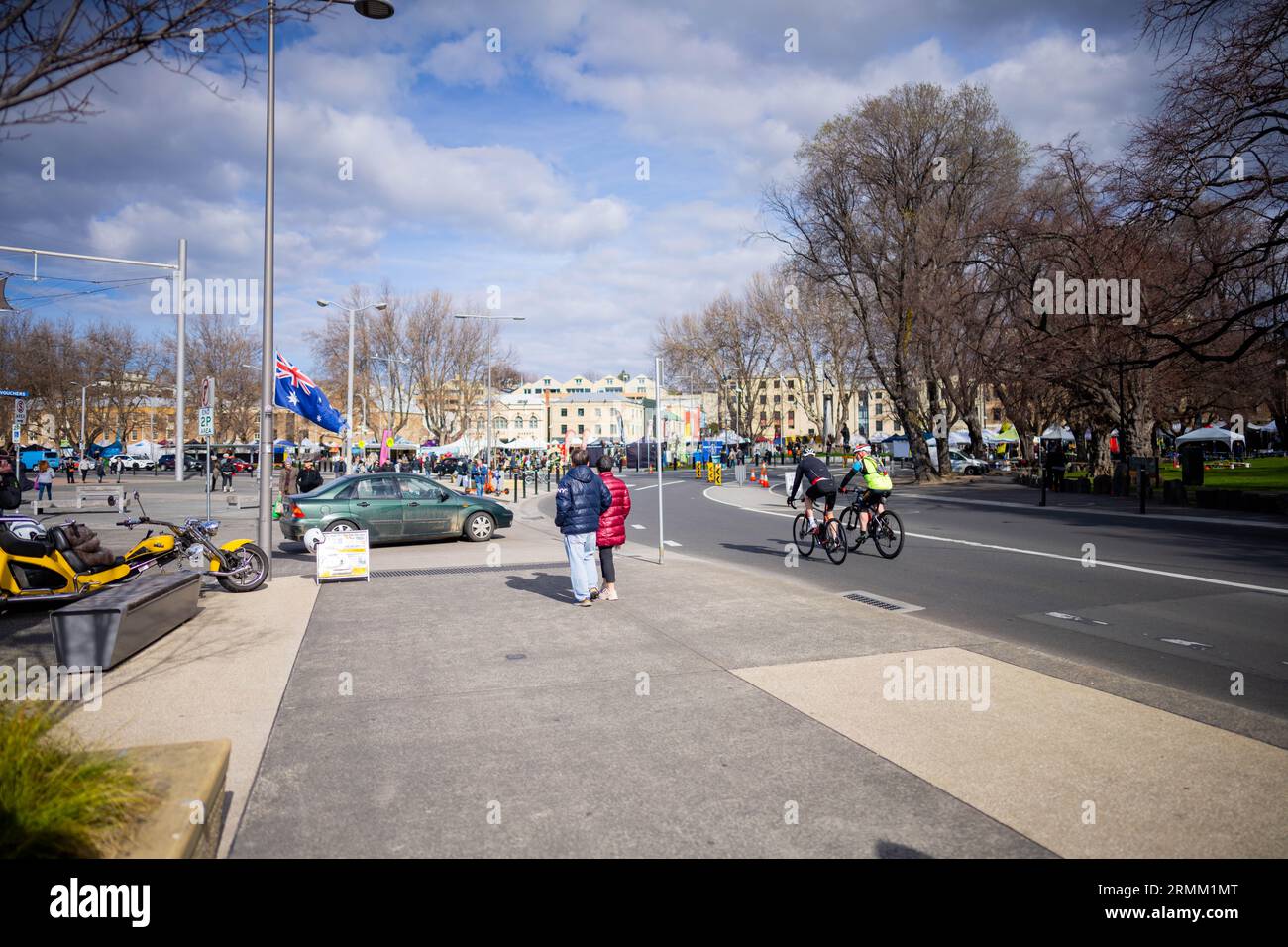 Weekend country market in a park in Australia. Family’s and people at a ...