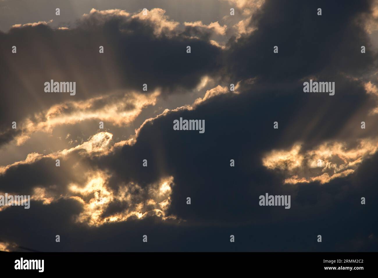 Rays of sunshine through clouds hi-res stock photography and images - Alamy