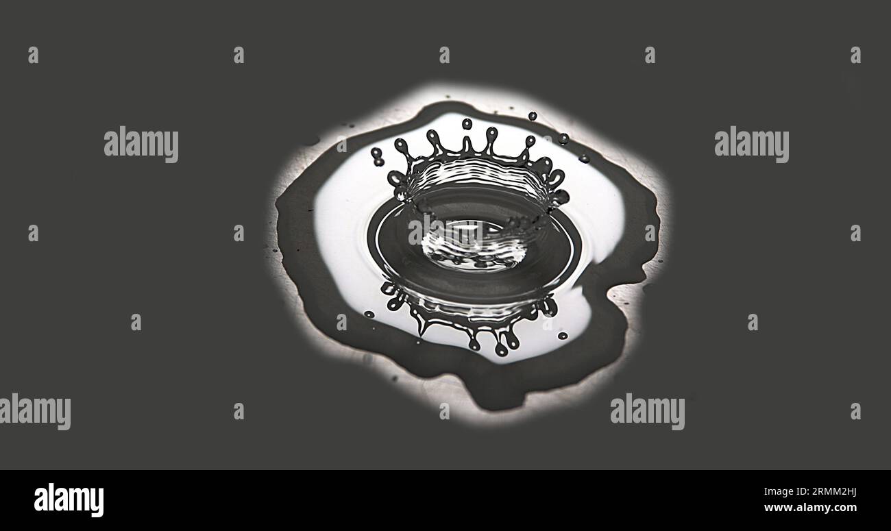 Drop of Water falling into Water, Full Moon Stock Photo - Alamy