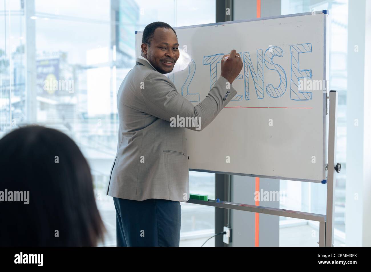 Professor writing whiteboard hi-res stock photography and images - Alamy
