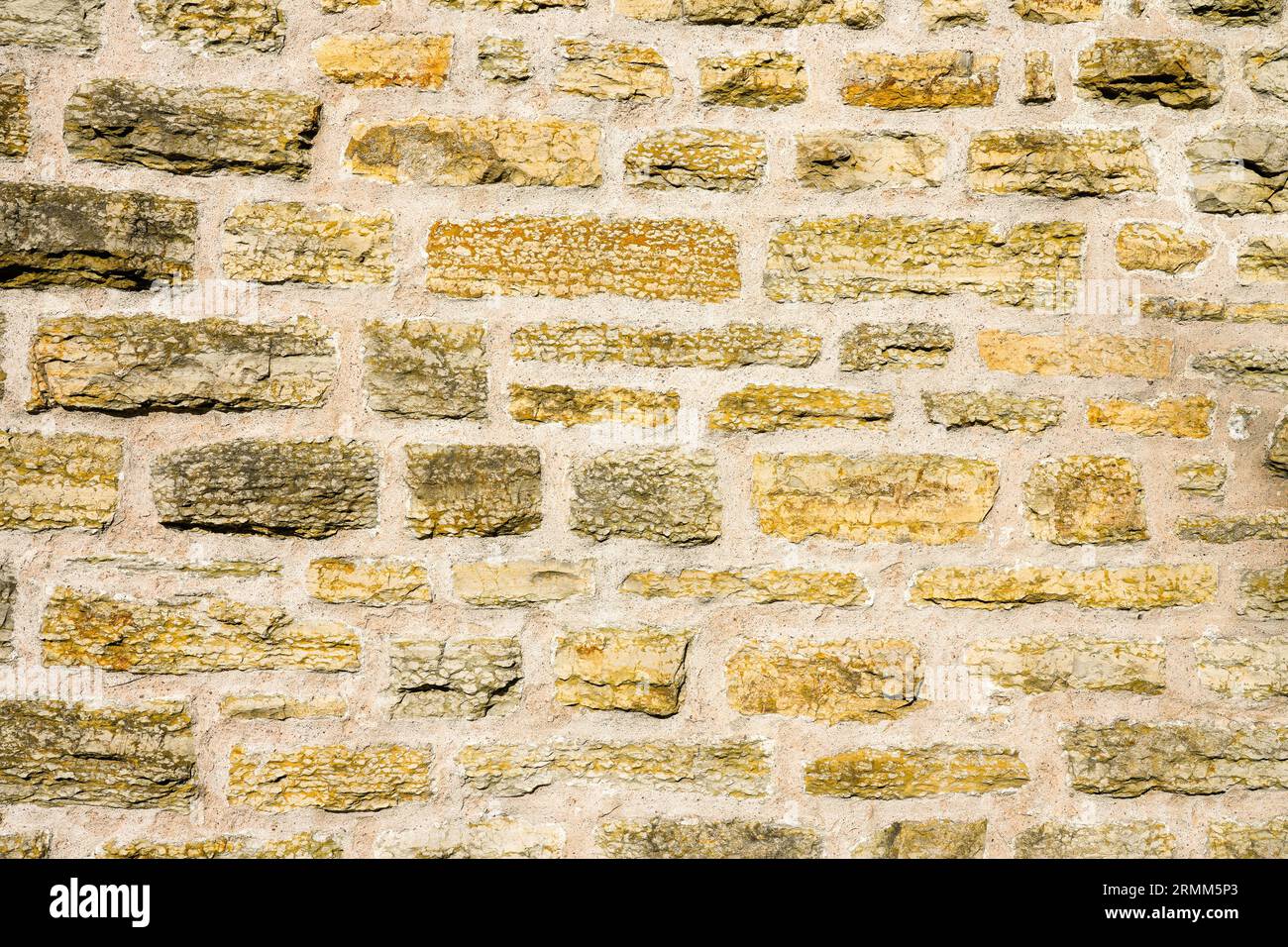 Old rustic stone wall as template for background Stock Photo - Alamy