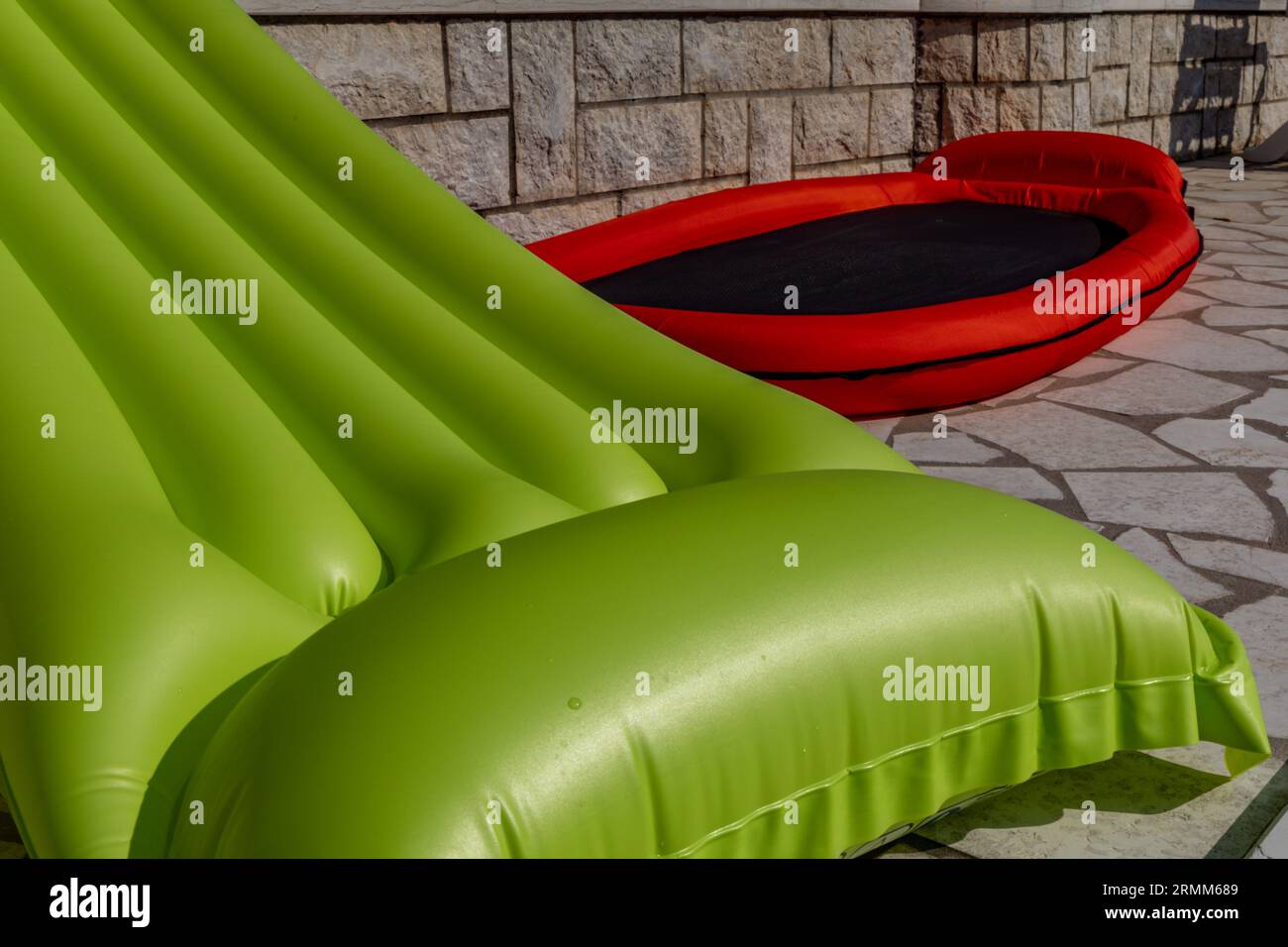 Swimming on a mattress inflatable mattress in the pool taking up space ...