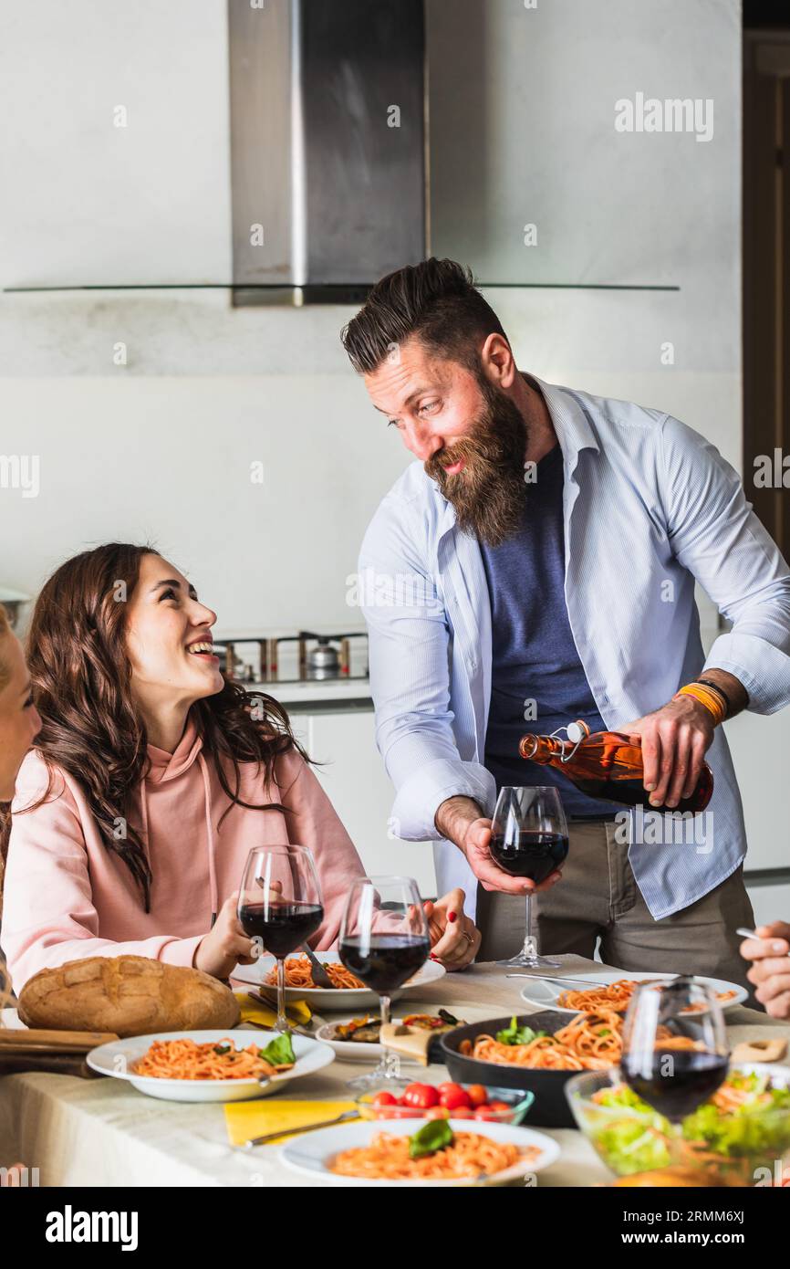 Family group enjoying pasta hi-res stock photography and images - Alamy