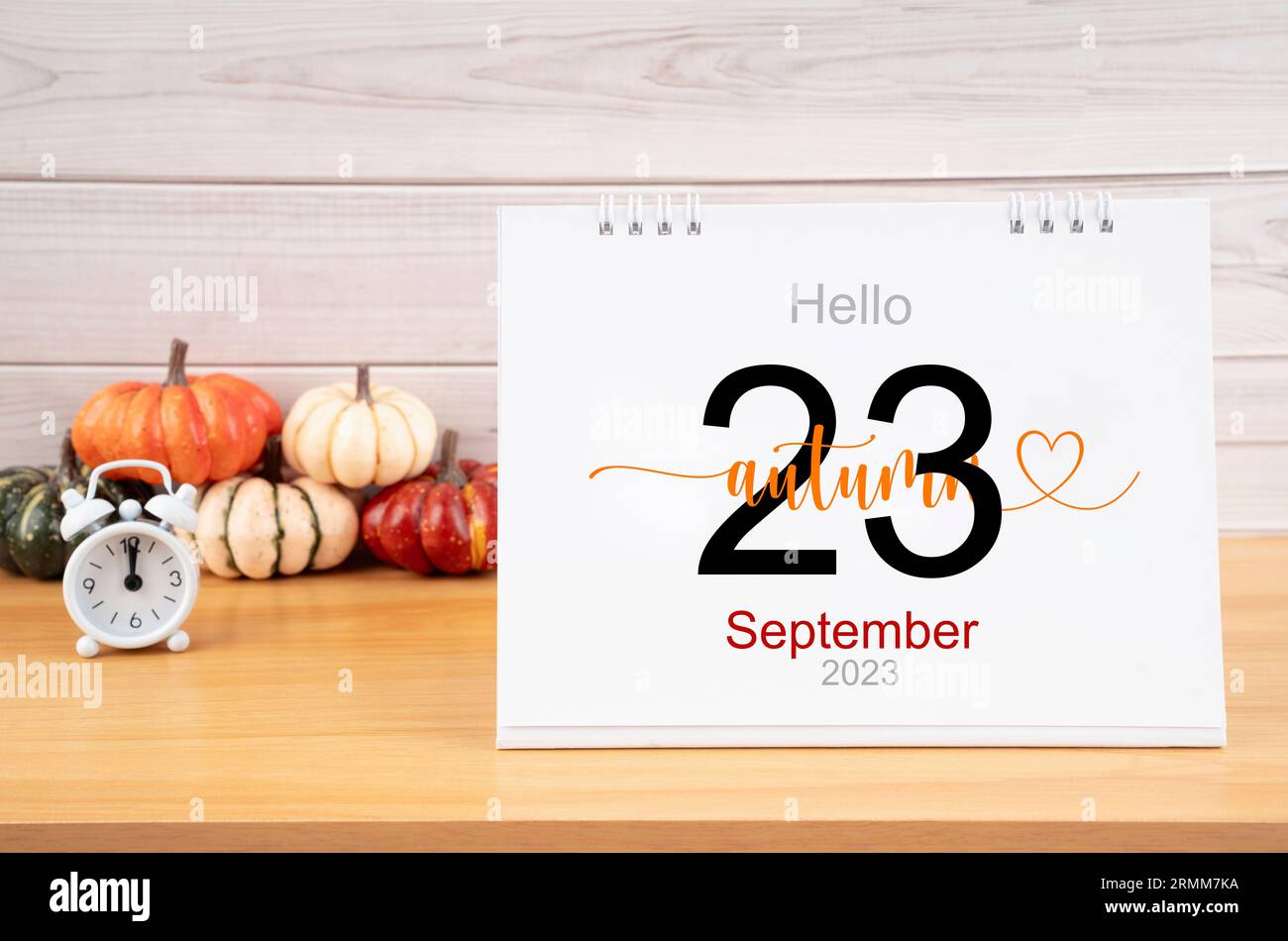 Hello autumn on 23rd September 2023 desk calendar with pumpkins Stock ...