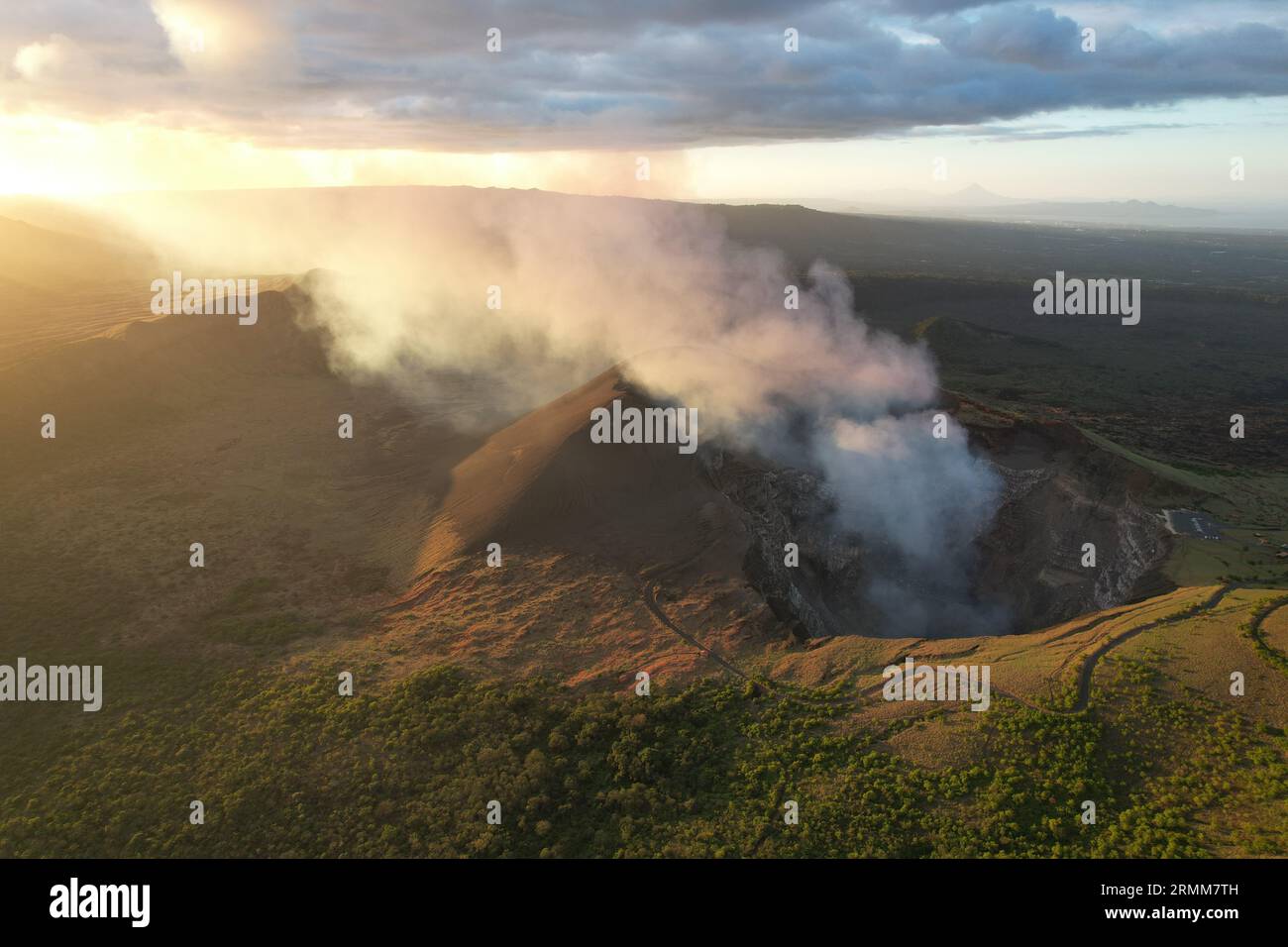 Smoke coming out from Santiago volcano crater aerial drone view Stock ...