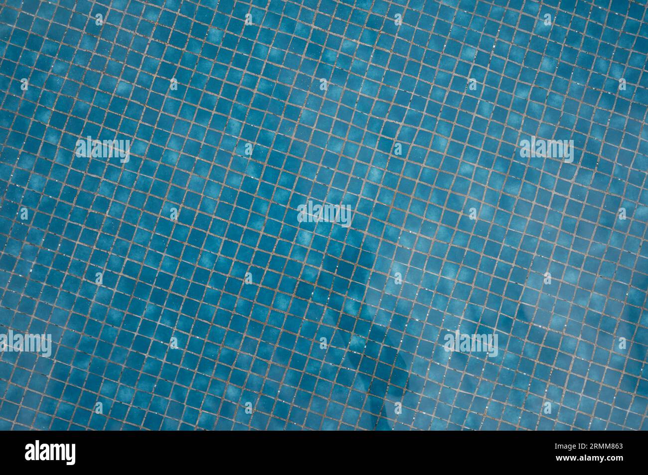 Pattern of blue pool tiles under water close up view background Stock ...