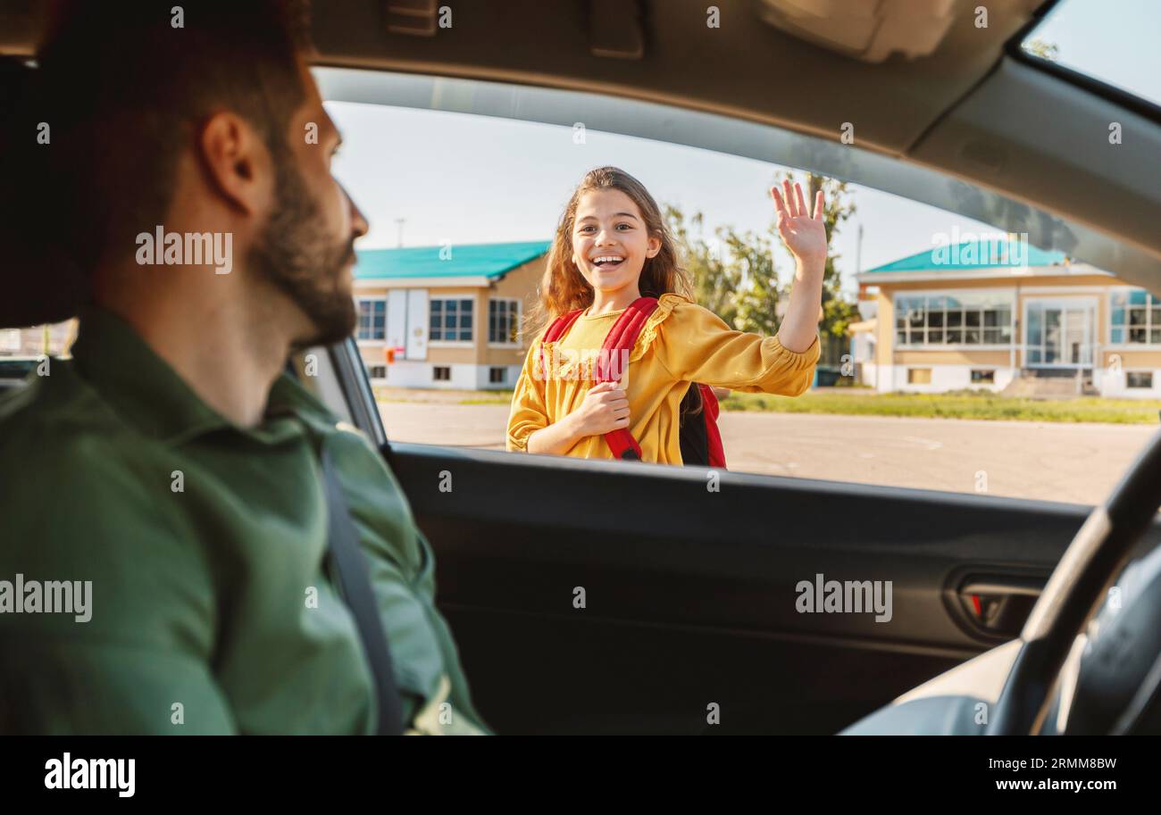 Waving Goodbye From Car