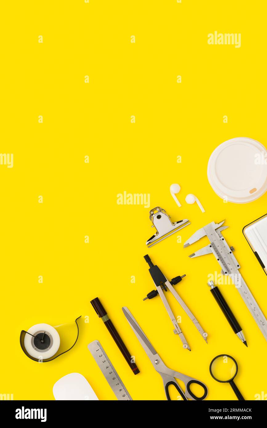 Things on my desk flat lay. Back to school flat lay on yelow background ...