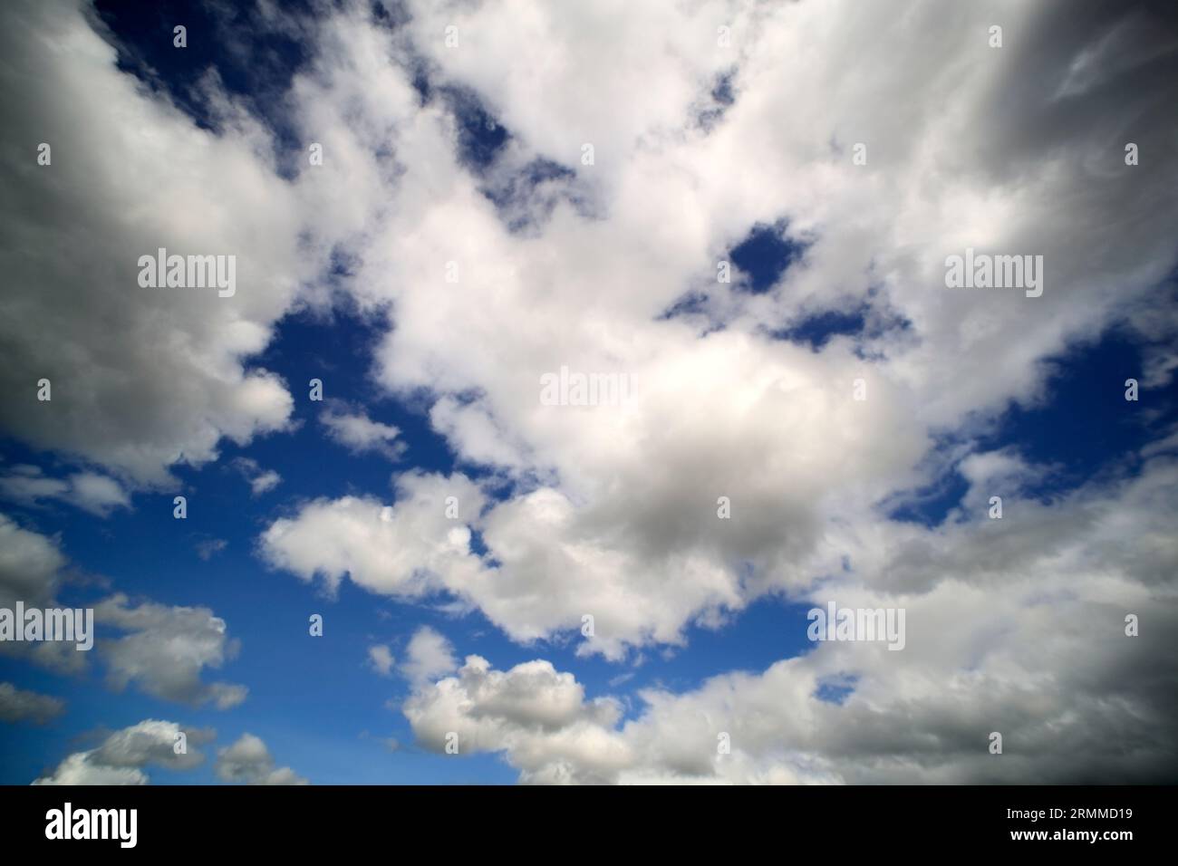Cumulus and Cumulonimbus Capillatus are low clouds Stock Photo - Alamy