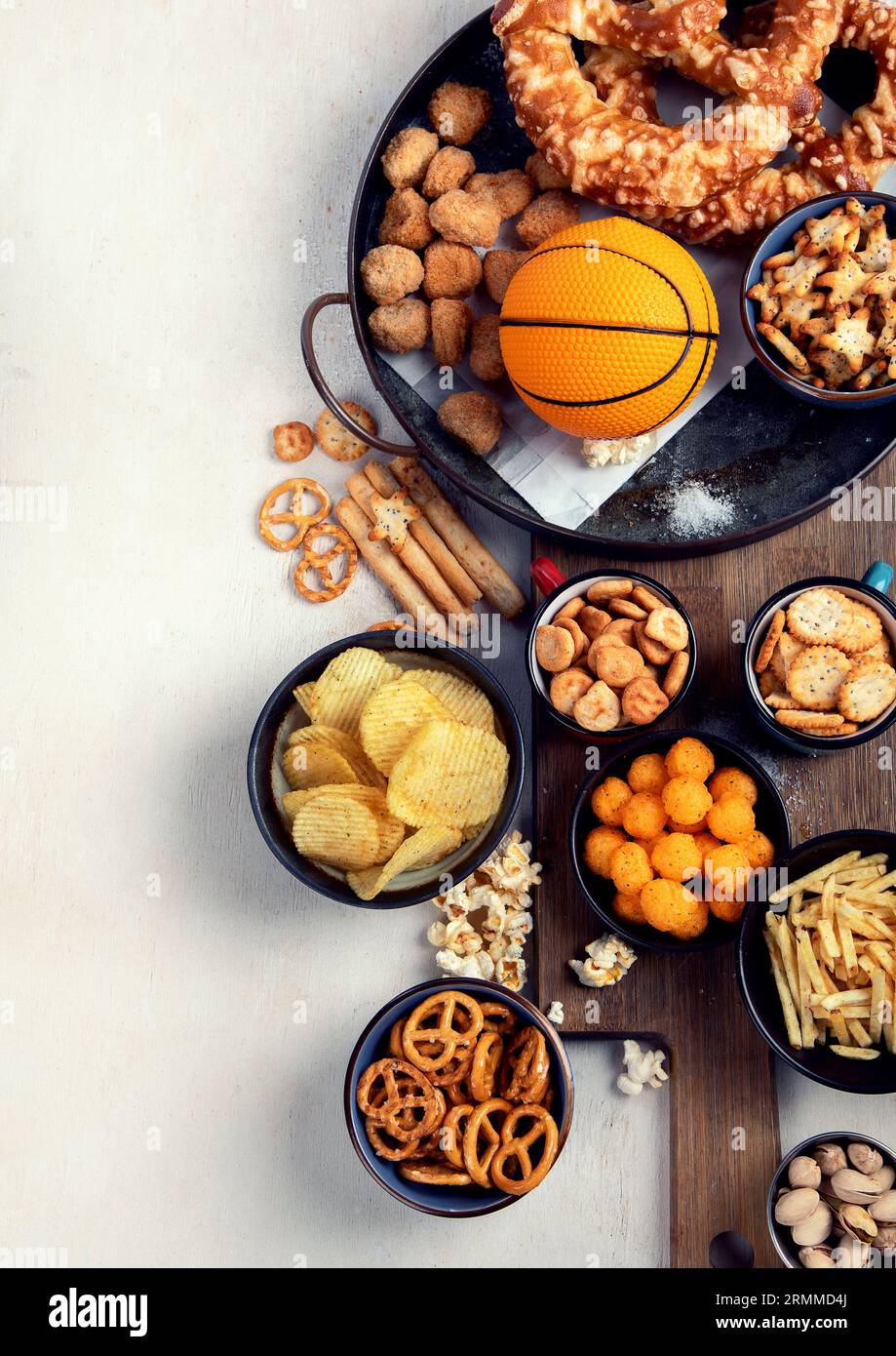 Set of various basketball fans and stadium snacks, chips, sauces on a ...