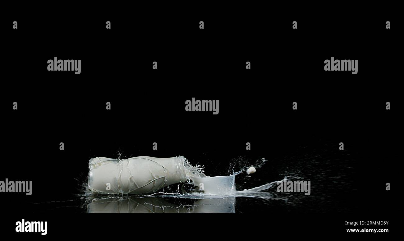 Bottle milk falling exploging hi-res stock photography and images - Alamy