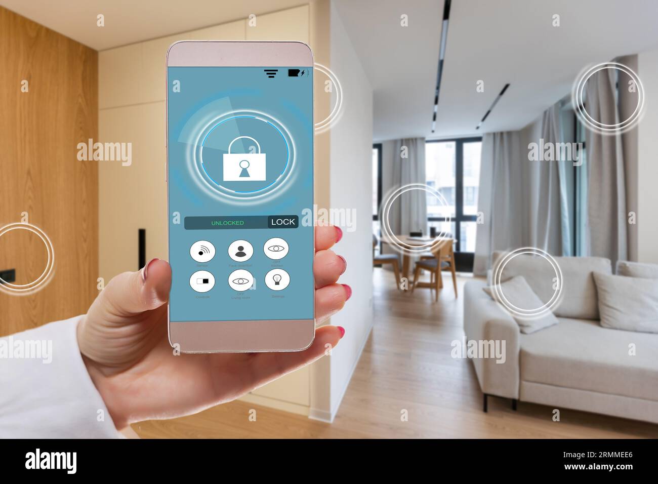 Smart home technology interface on smartphone app screen with augmented ...