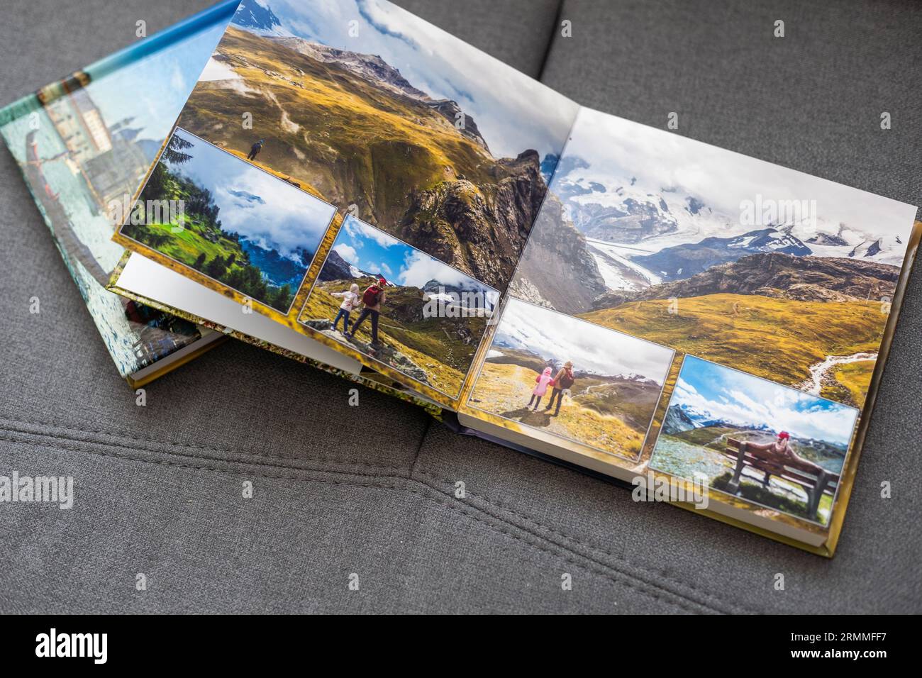 close up. photo book binding. storing photos from a photo session in a ...